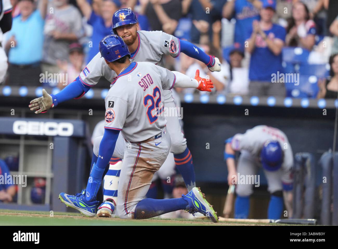 New York Mets' Brandon Nimmo greets Juan Soto (22) after Soto scored on ...