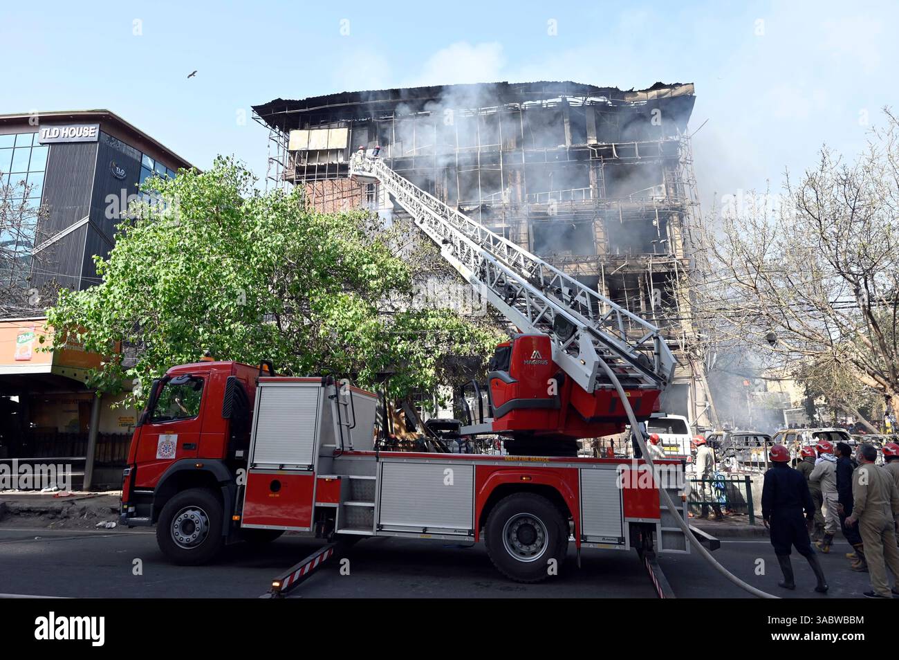 NEW DELHI, INDIA - APRIL 1: Firefighters try to douse a fire that broke ...