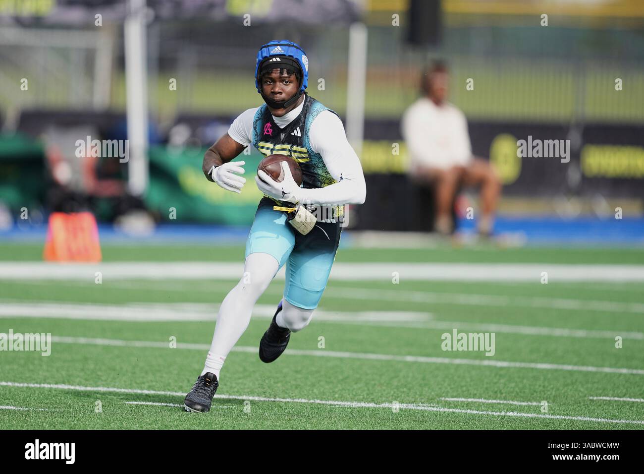 SFE wide receiver Eric McFarland gains yards after a catch during OT7 ...