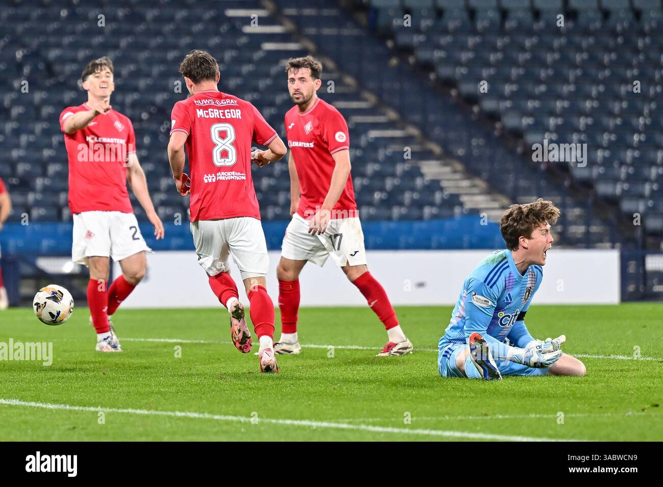 Glasgow, Scotland, UK. 2nd April, 2025. Queen’s Park goalkeeper and ...
