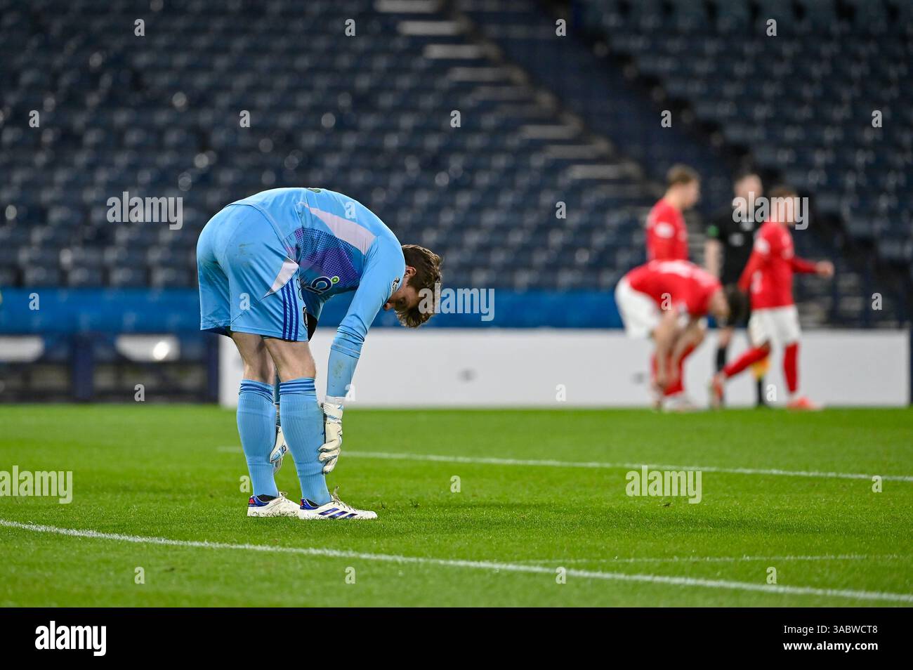 Glasgow, Scotland, UK. 2nd April, 2025. Queen’s Park goalkeeper and ...