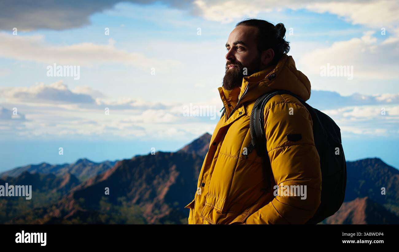 Male hiker takes a deep breath of fresh mountain air feeling pleased ...
