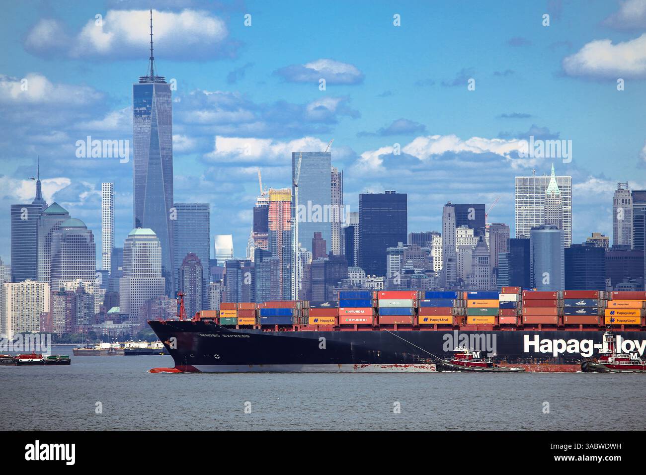 New York, US - March, 27 2025: Large container ship with import ...