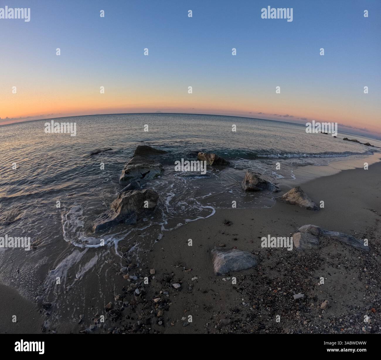 Winter Mediterranean sunset seen from the sicilian coast Stock Photo ...