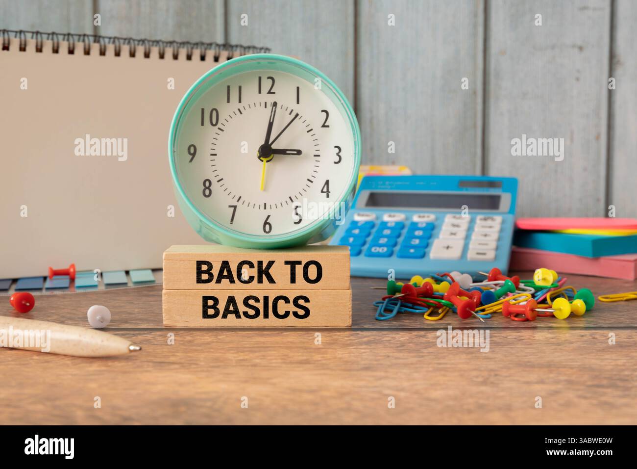 back to basics text on wooden blocks that lie on a white background ...