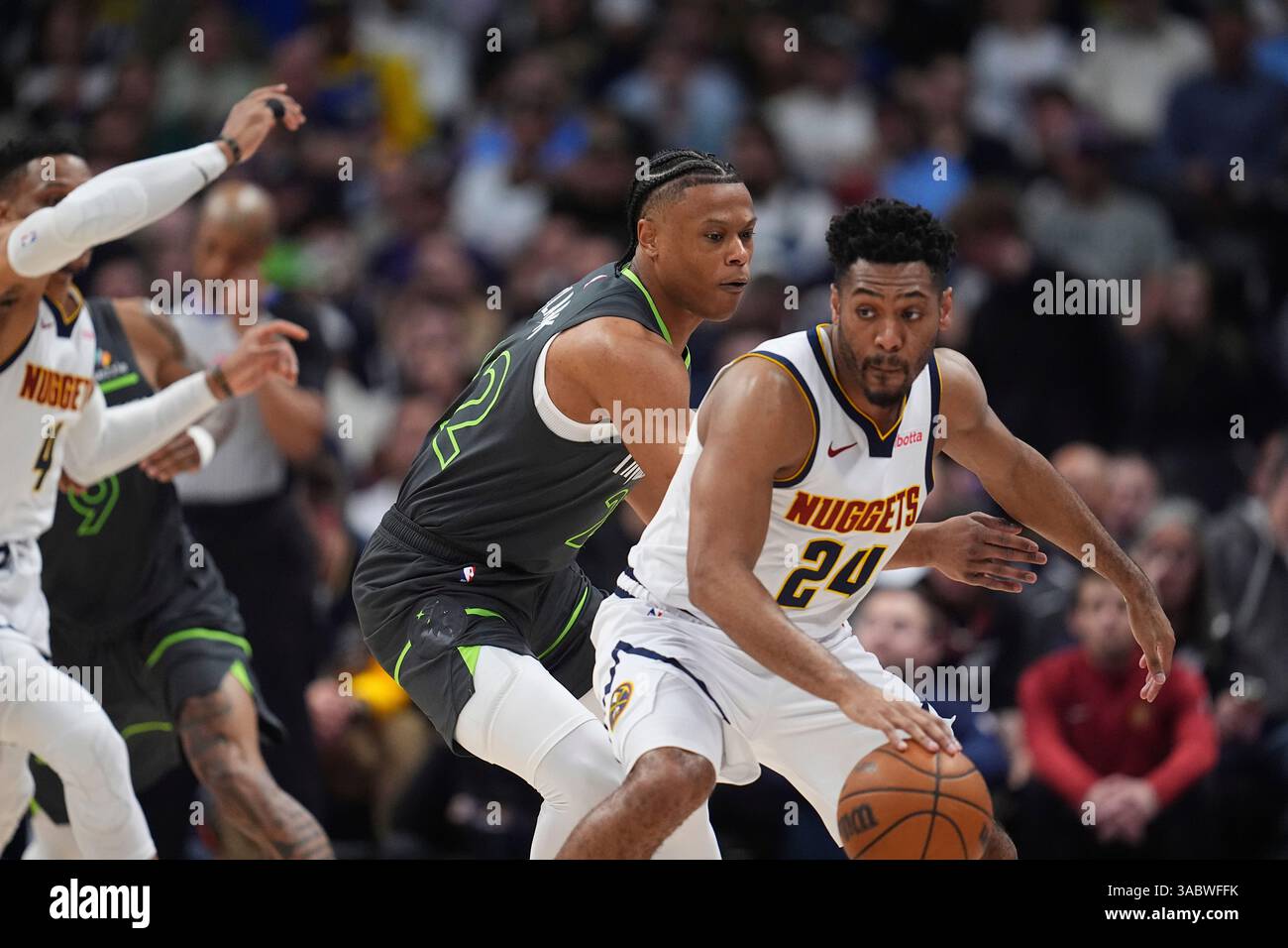 Denver Nuggets guard Jalen Pickett (24) and Minnesota Timberwolves ...