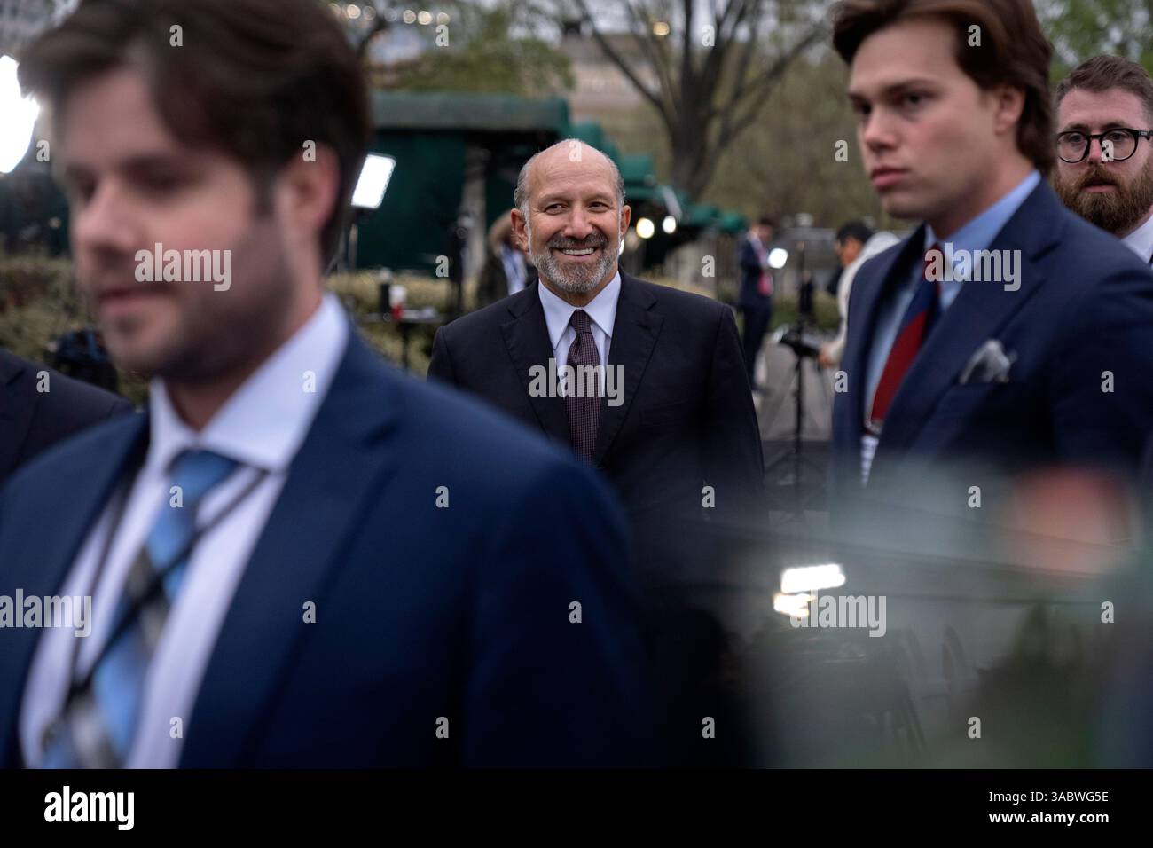 Commerce Secretary Howard Lutnick leaves after doing a television ...