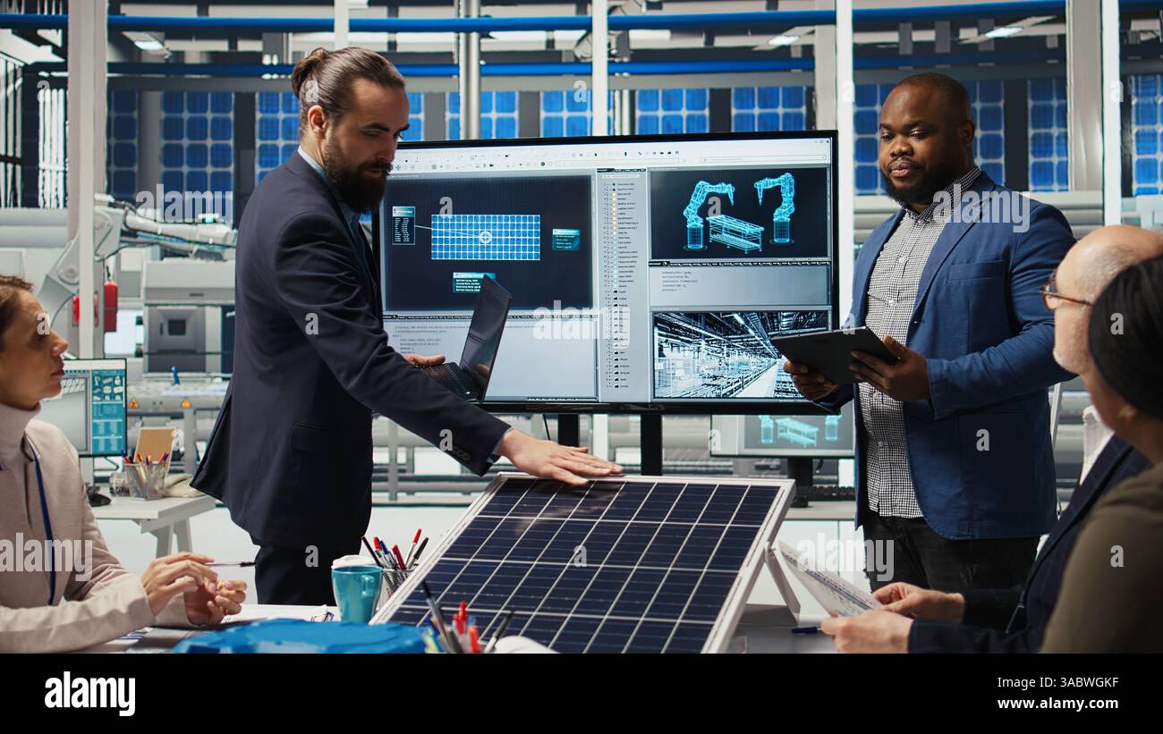Factory managers doing pitch in front of investors, showing plans for ...