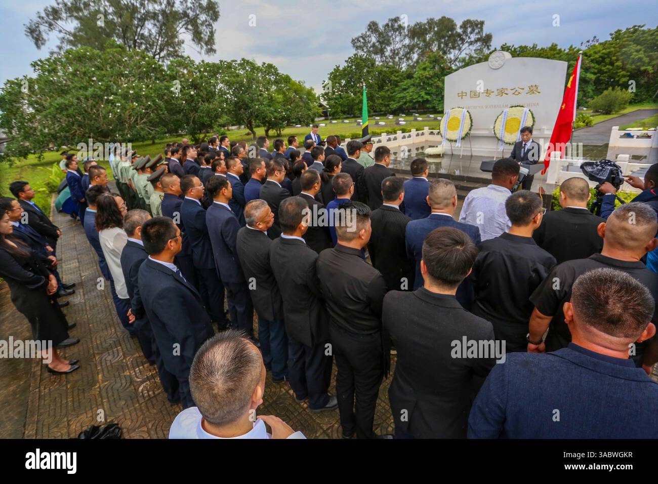 Dar Es Salaam, Tanzania. 2nd Apr, 2025. People attend a wreath-laying ...