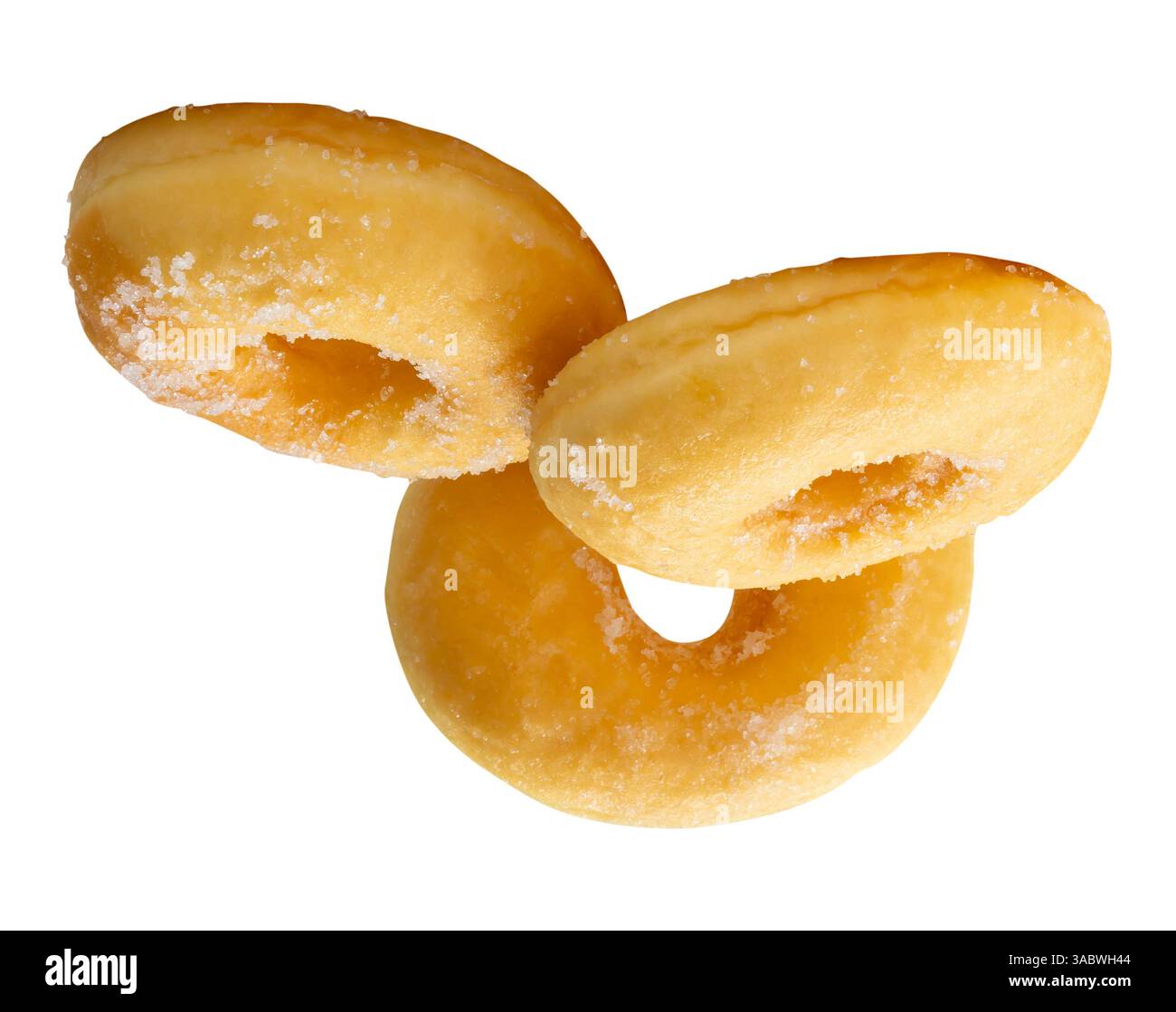 Side view of brown sugar glazed cinnamon donuts in stack is isolated on ...