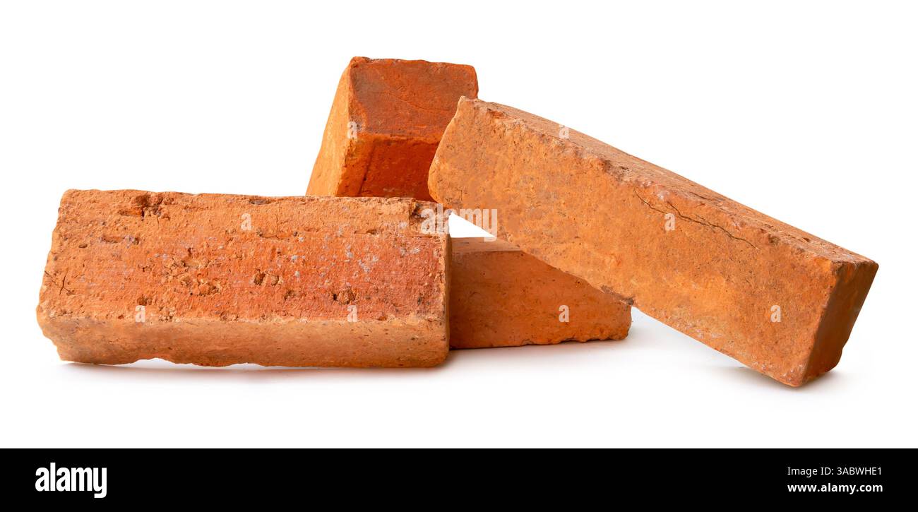 Side view of four cracked old red or orange bricks in stack is isolated ...