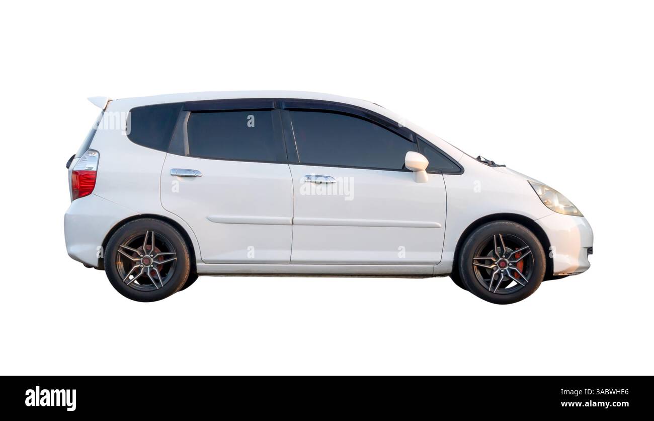 Right side view of single mini or small white hatchback car is isolated ...