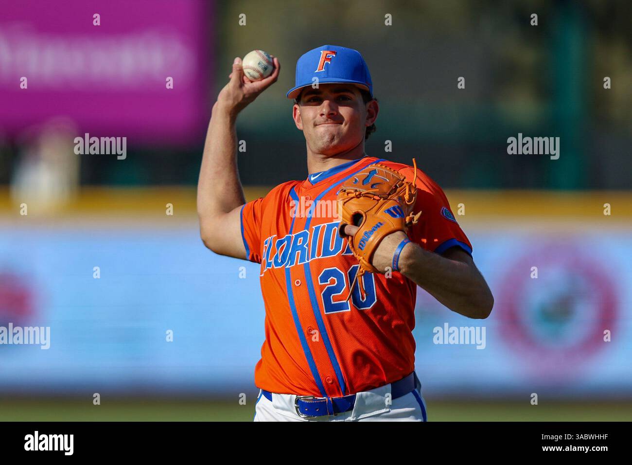 Florida pitcher Jake Clemente (20) warms up before an NCAA baseball ...