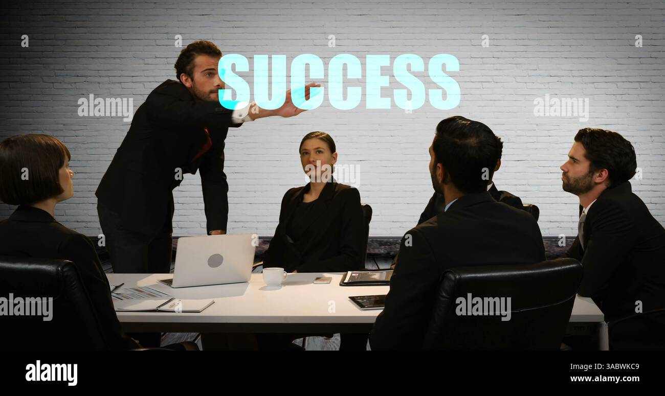 Business team in meeting room discussing strategies for achieving ...
