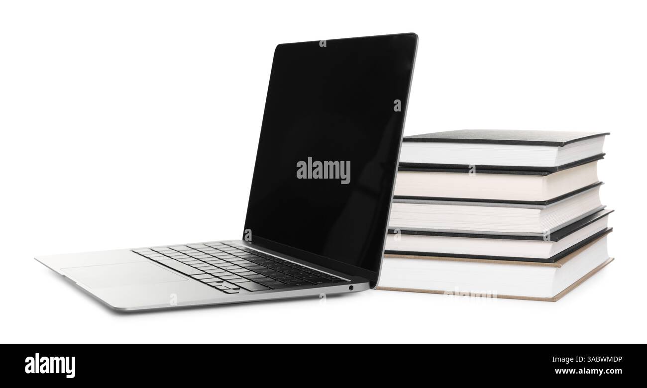 Closed hardcover books and laptop isolated on white Stock Photo - Alamy