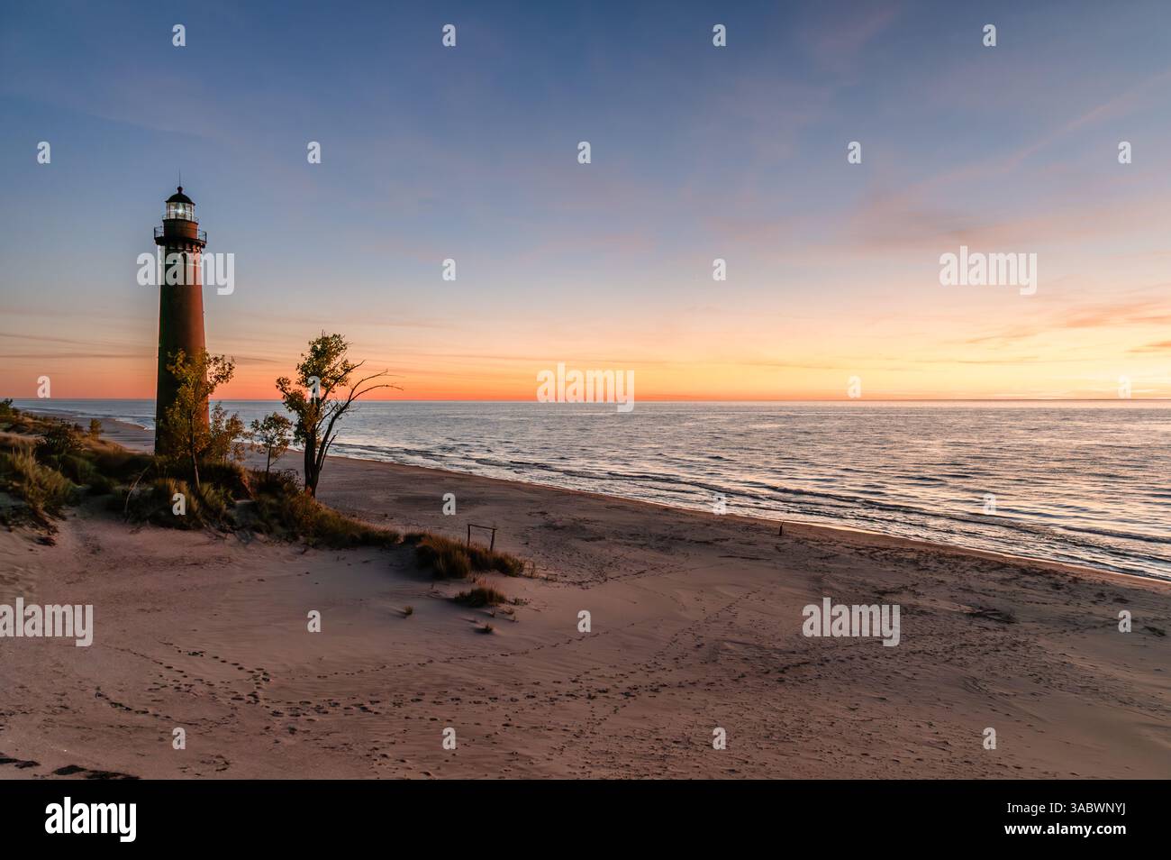 Little Sable Lighthouse on Lake Michigan at sunset Stock Photo - Alamy