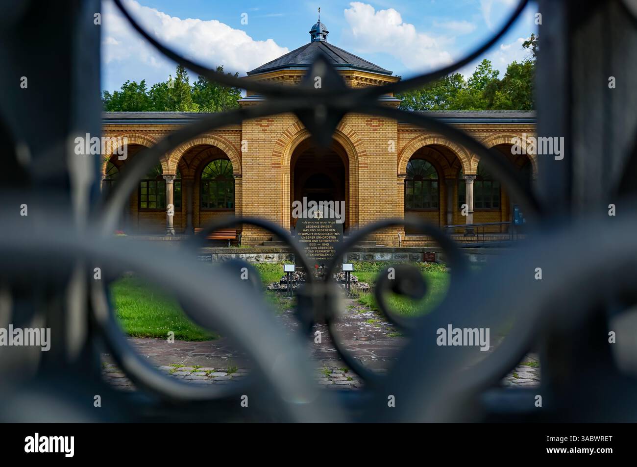 View through the main gate of the Jewish Cemetery in Berlin-Weißensee ...