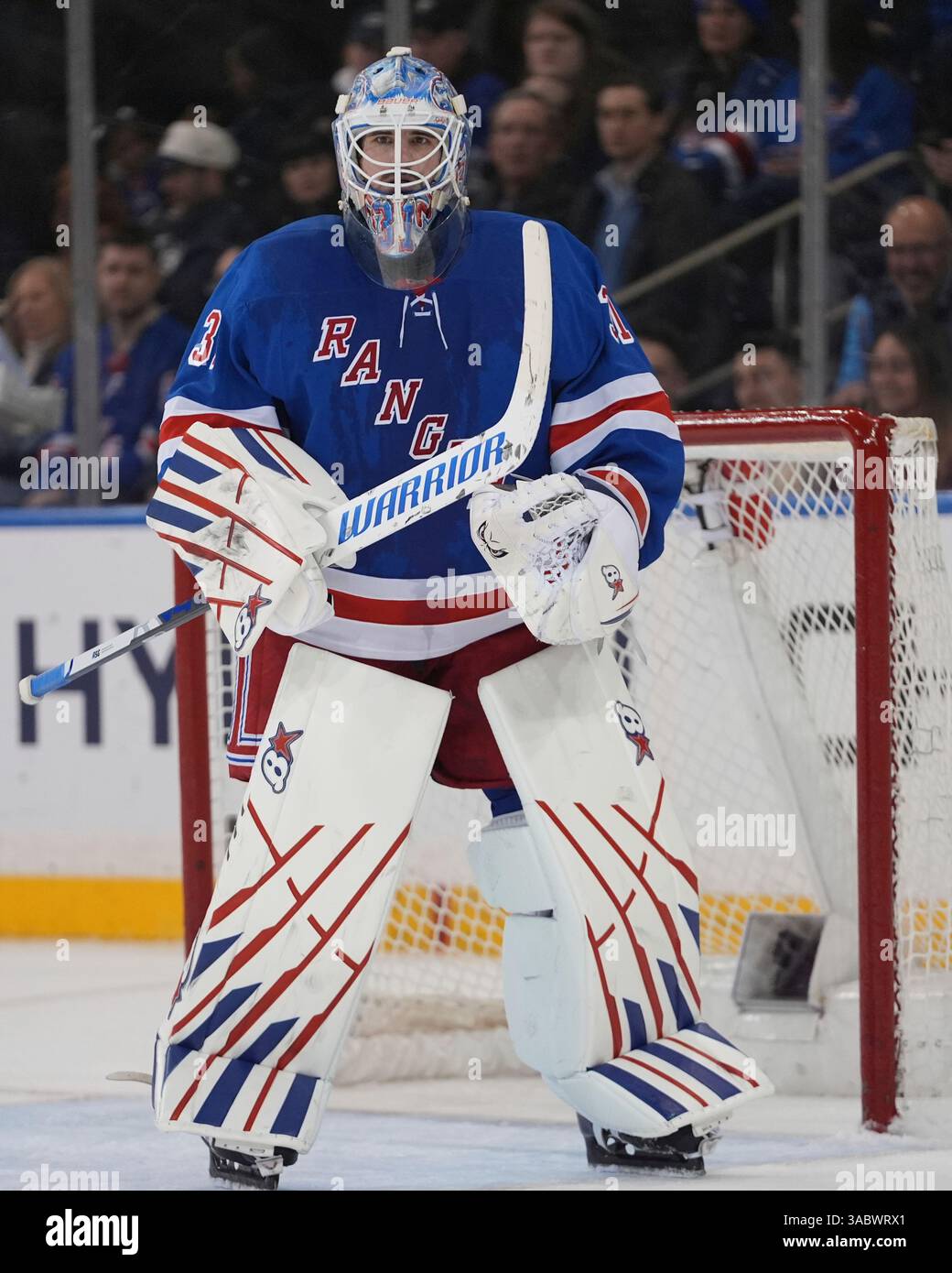 New York Rangers goaltender Igor Shesterkin (31) protects the net ...