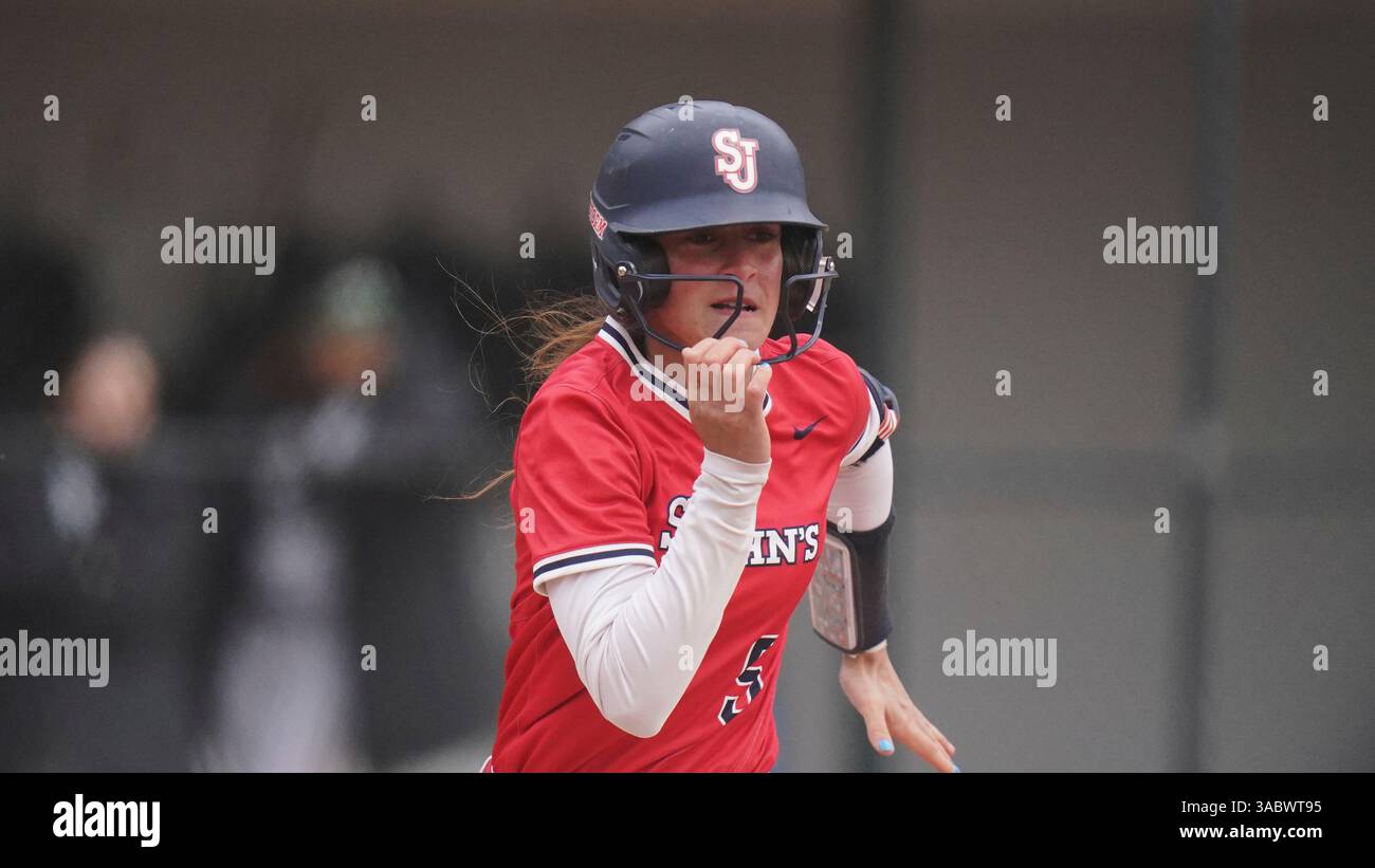 St. John's utility Natalie Casto (5) runs to first during an NCAA ...