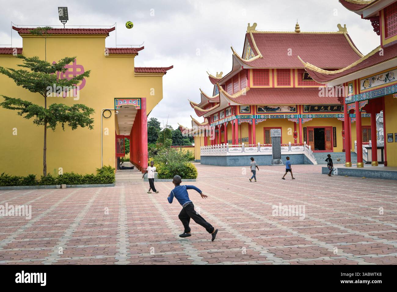 Lusaka, Zambia. 31st Mar, 2025. Shaolin disciples play football at the ...