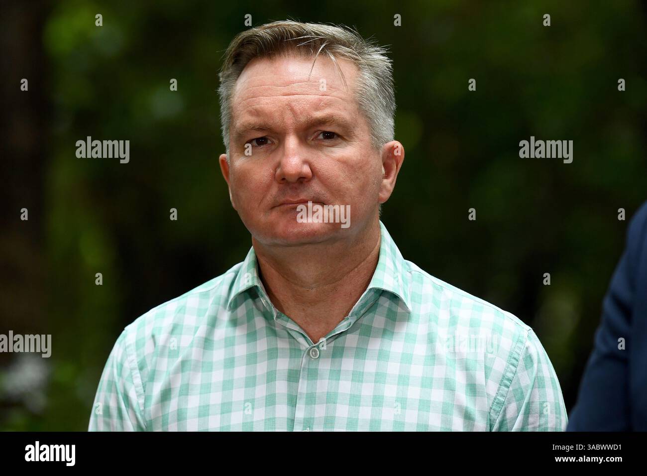 Federal Minister for Climate Change and Energy Chris Bowen looks on ...