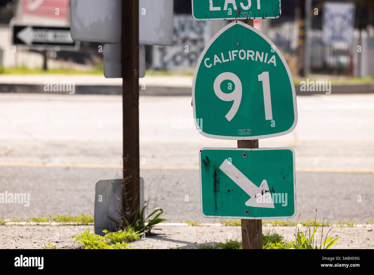 Compton, California, USA - April 2, 2025: A directional sign marks the ...