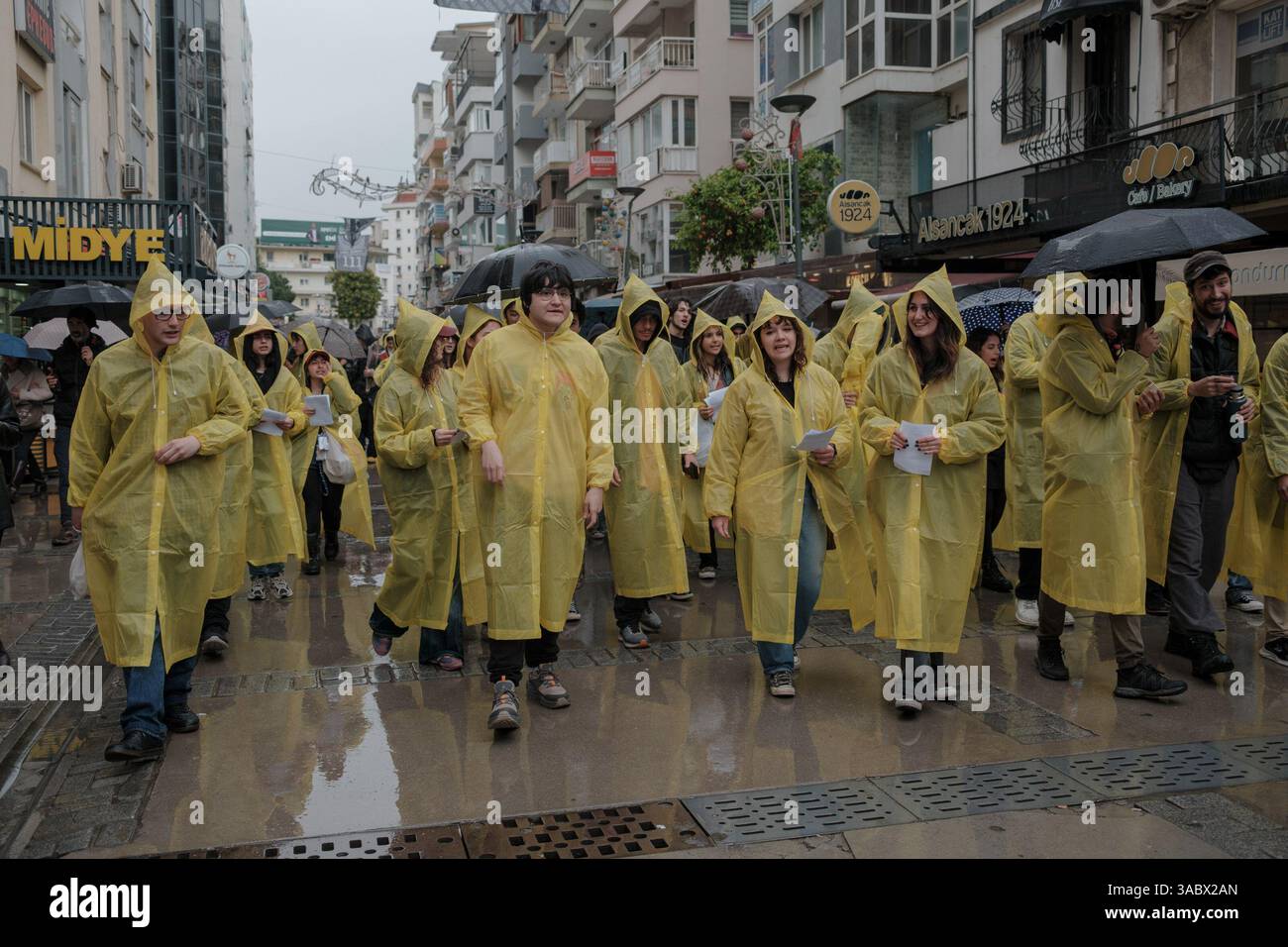 Young people distribute leaflets urging people to support the boycott ...
