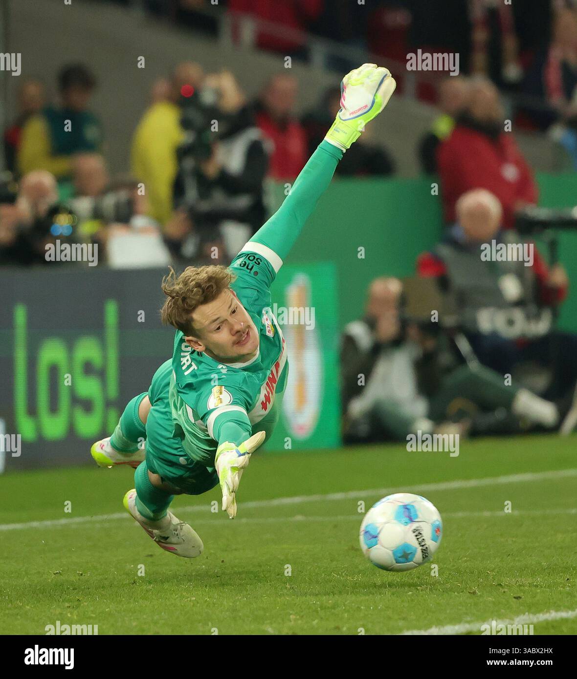 Stuttgart, Germany. 2nd Apr, 2025. VfB Stuttgart' s goalkeeper Alexander Nuebel makes a save ...