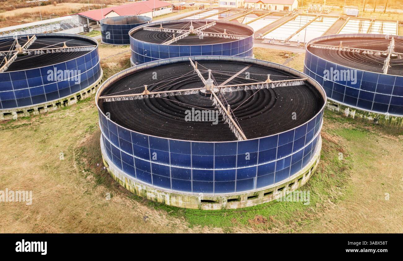 Aerial view wastewater treatment plant with large circular biofilters ...
