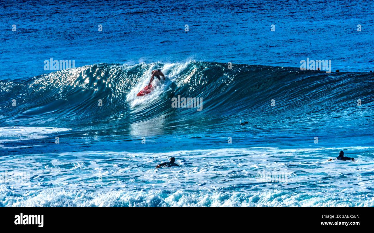 Colorful Surfer Taking Off on Wave Banzai Pipeline Pipeline North Shore ...