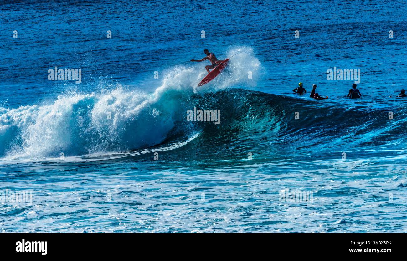 Colorful Surfer Jumping Large Wave Banzai Pipeline Pipeline North Shore ...