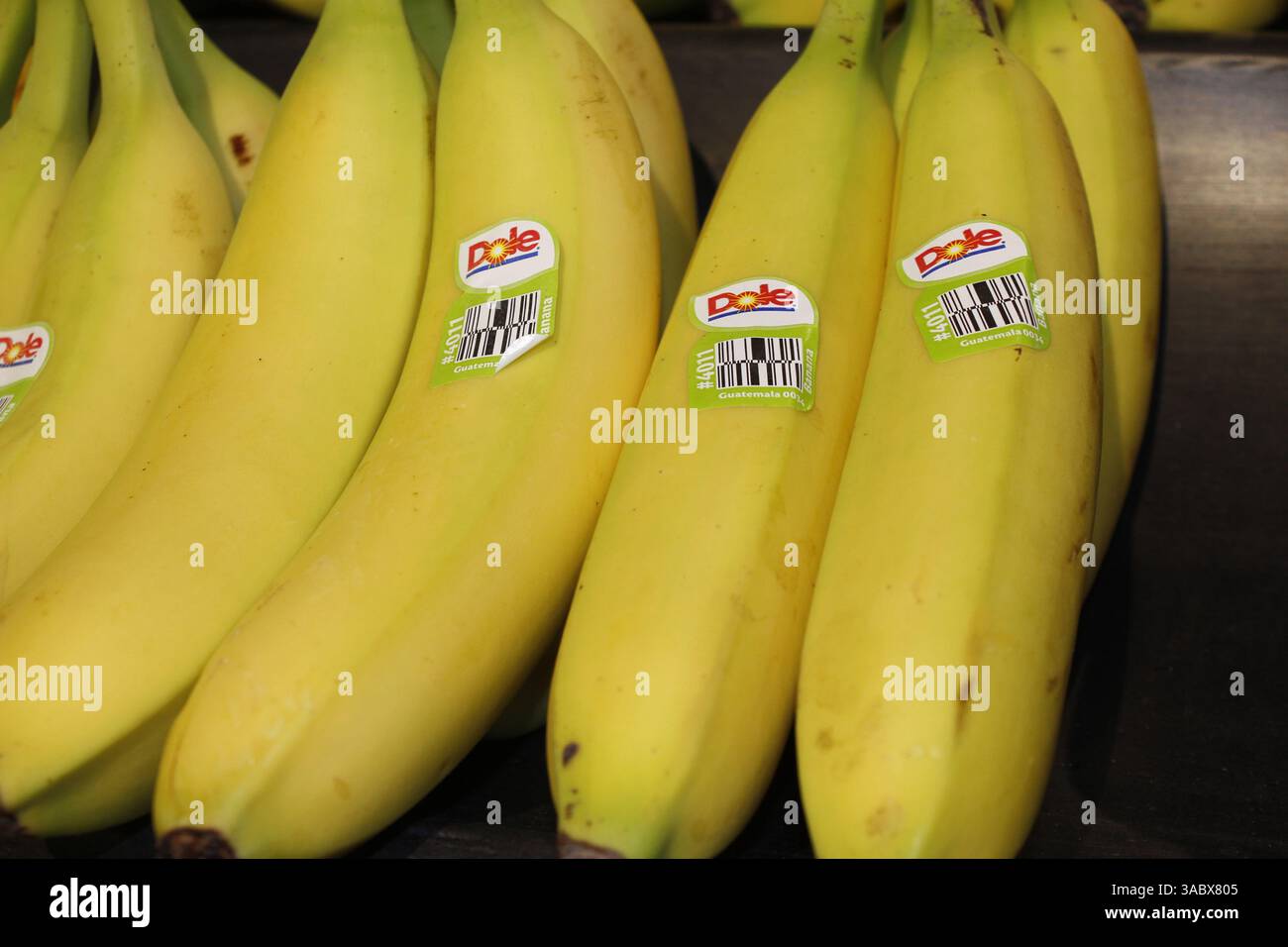 Dole Bananas shot closeup on a shelf at a Supermarket Stock Photo - Alamy