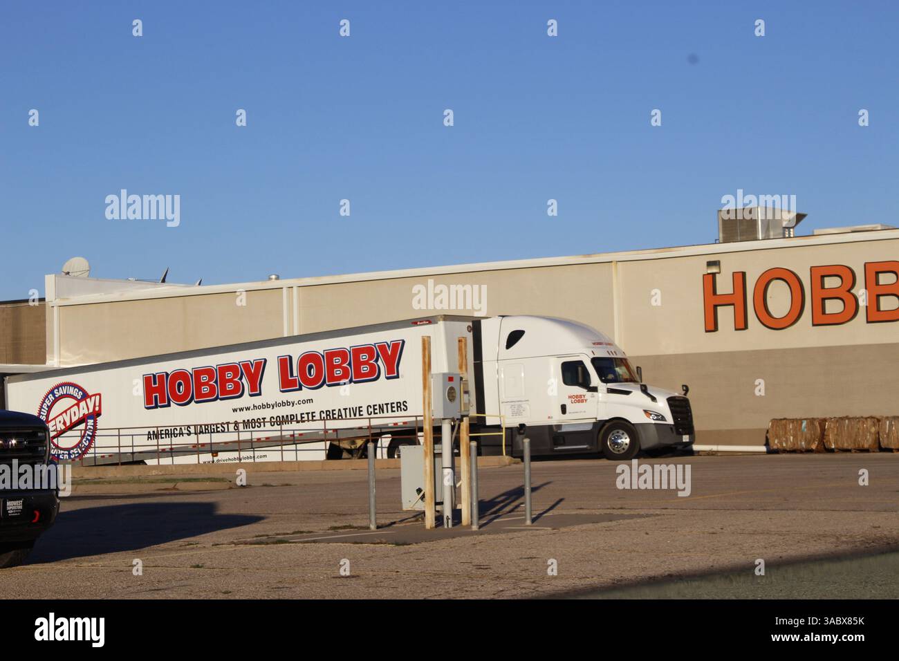 Hobby Lobby building with Semi and sign out back with blue sky outdoor ...