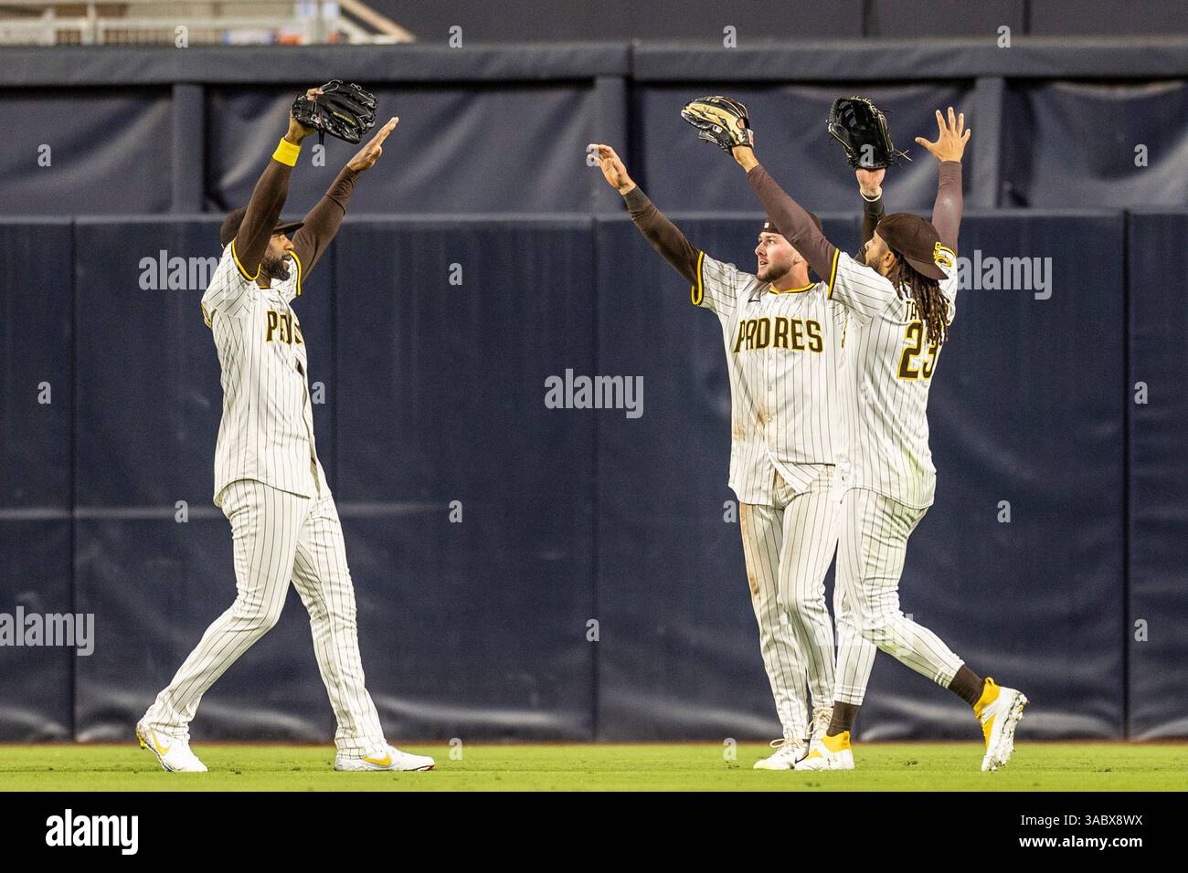 San Diego Padres right fielder Jason Heyward, left, center fielder ...