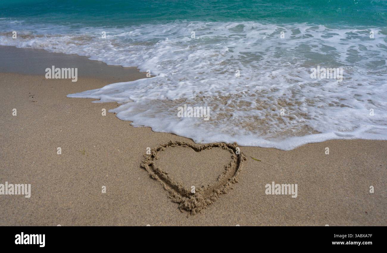 Sea beach sand. Scenic sea beach backdrop. Paradise ocean view. Heart ...