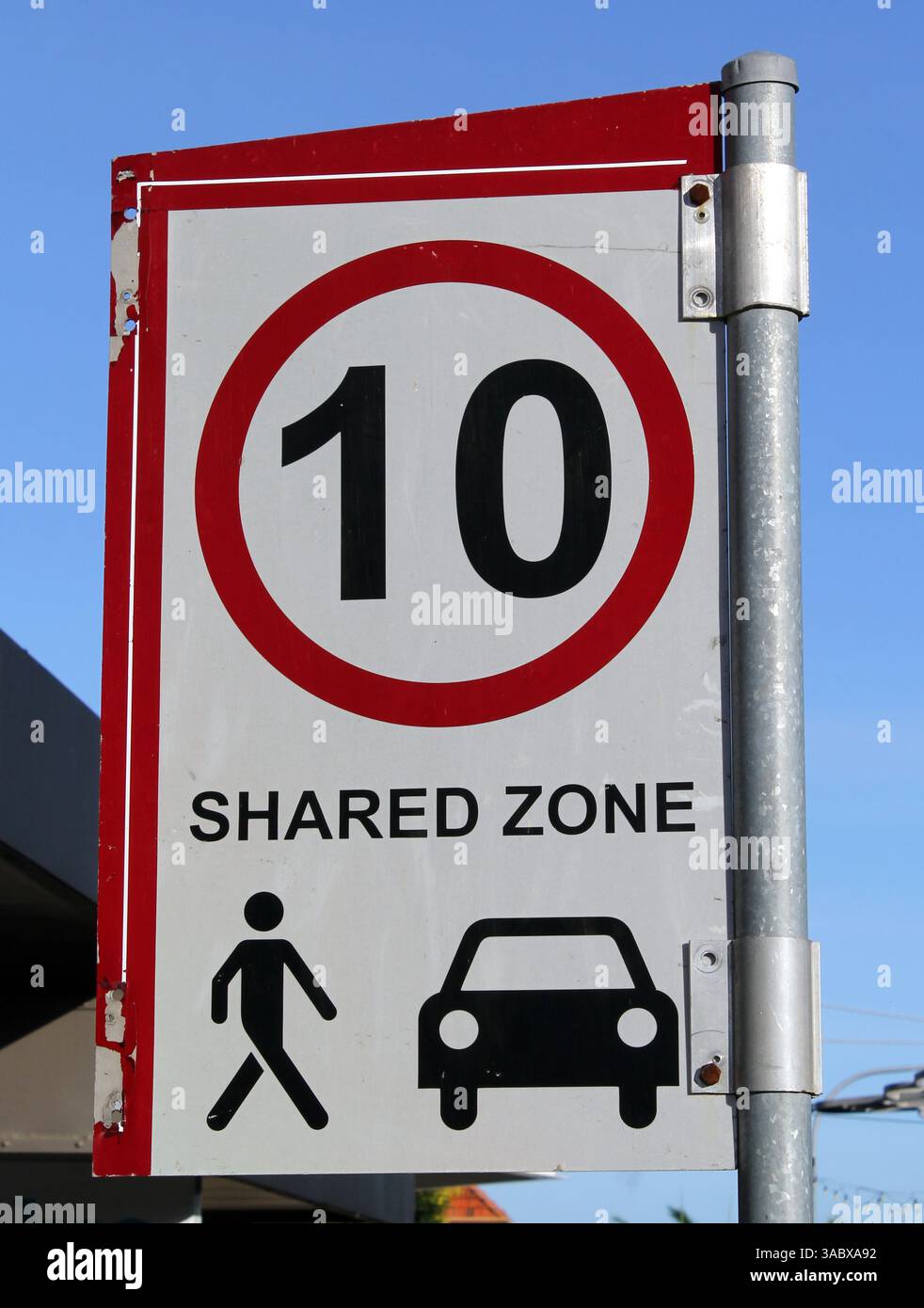 "Shared Zone" road sign for pedestrians and cars Stock Photo - Alamy