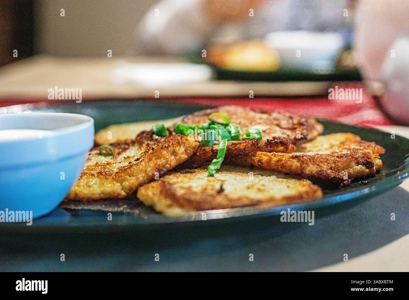 classic draniki with sour cream national ukrainian dish Stock Photo - Alamy
