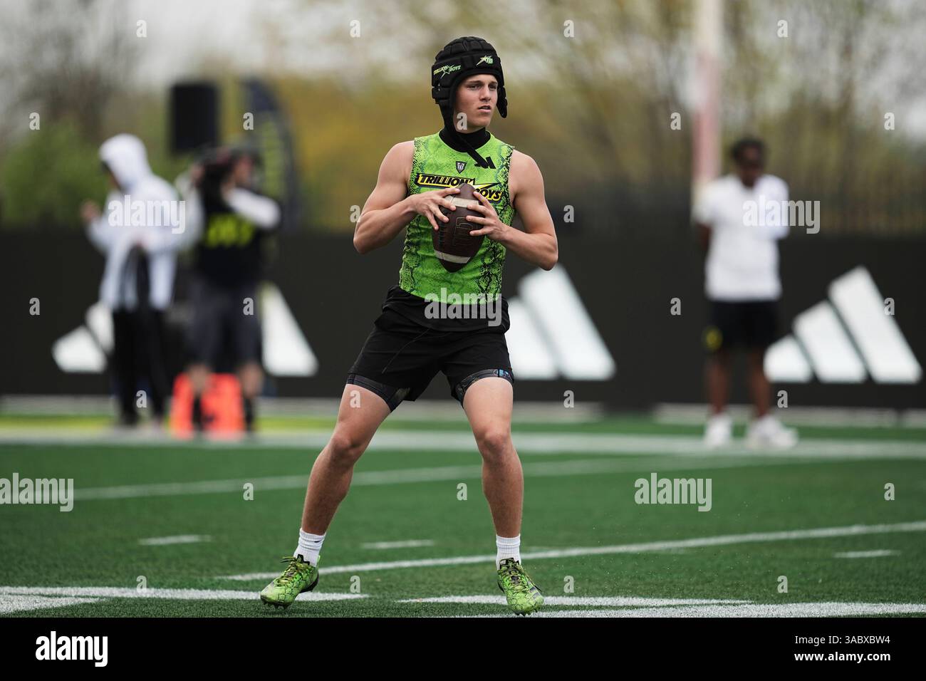 Trillion Boys quarterback Ryan Rakowski drops back to pass during an ...