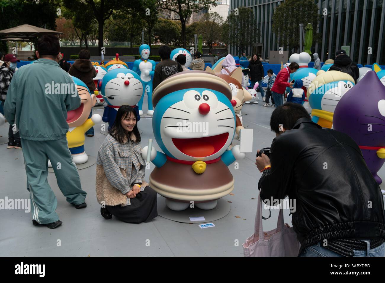 People visit a Doraemon exhibition in Shanghai, China, 31 March, 2025 ...