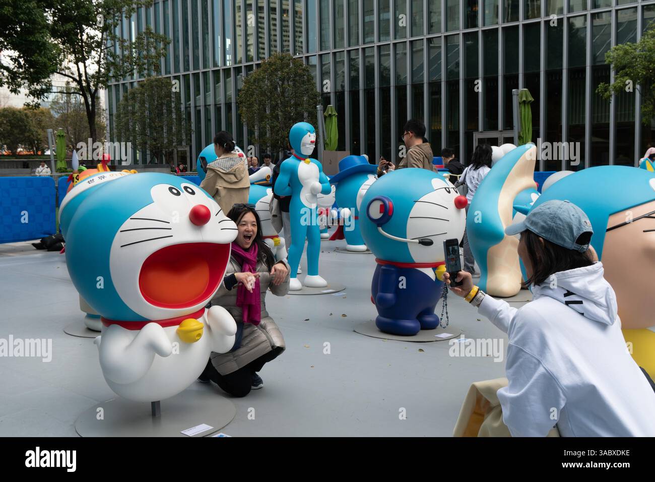 People visit a Doraemon exhibition in Shanghai, China, 31 March, 2025 ...