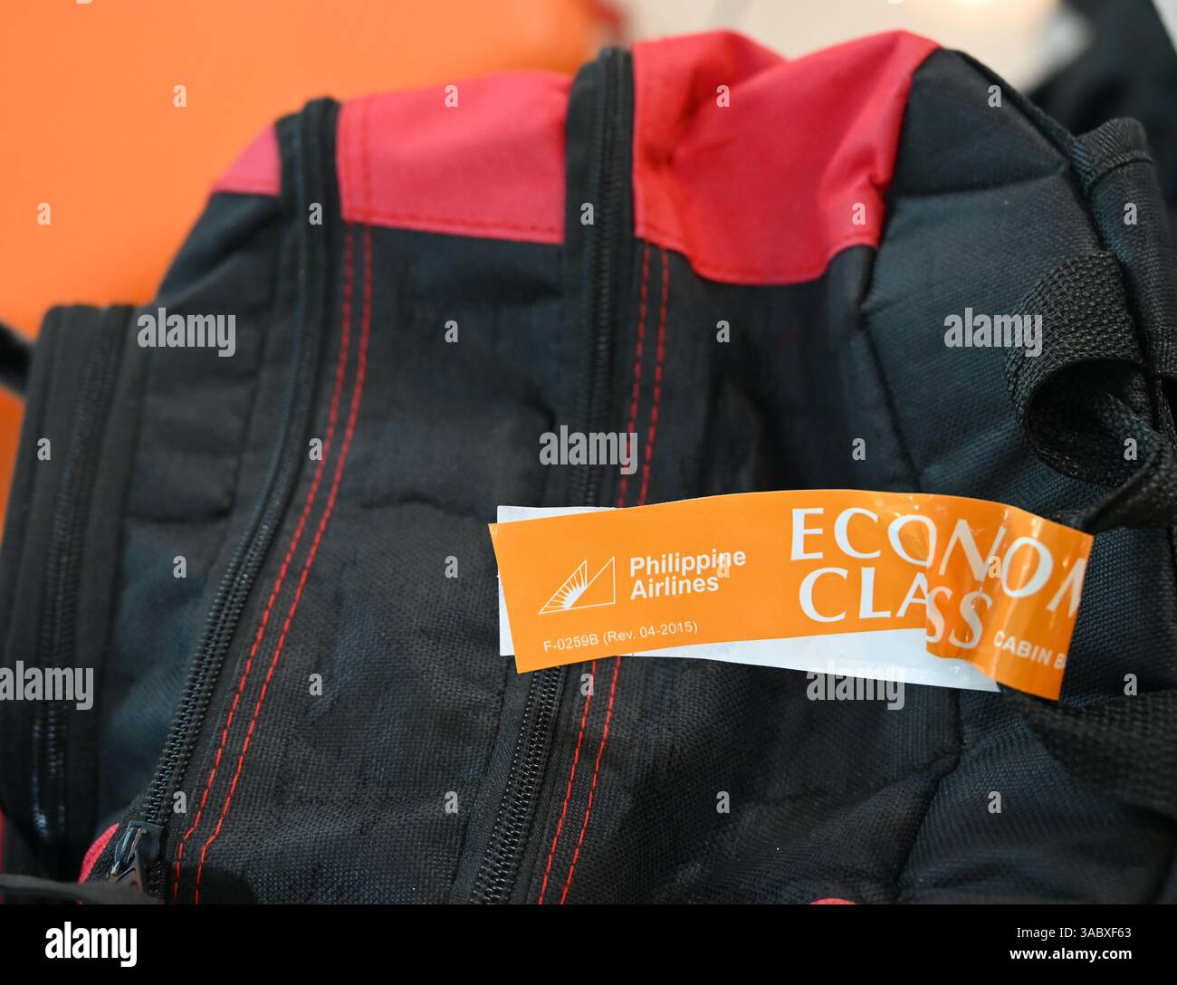 Philippines airline economy class hand luggage tag attached to the ...