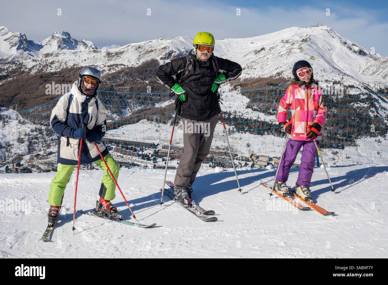 family on the slope before the descent at the Italian ski resort in the ...