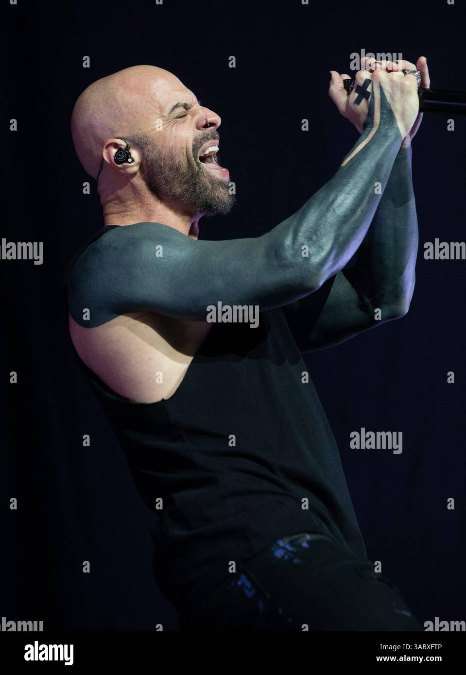 Chris Daughtry performs with his band Daughtry as the opening act for Disturbed on Wednesday ...