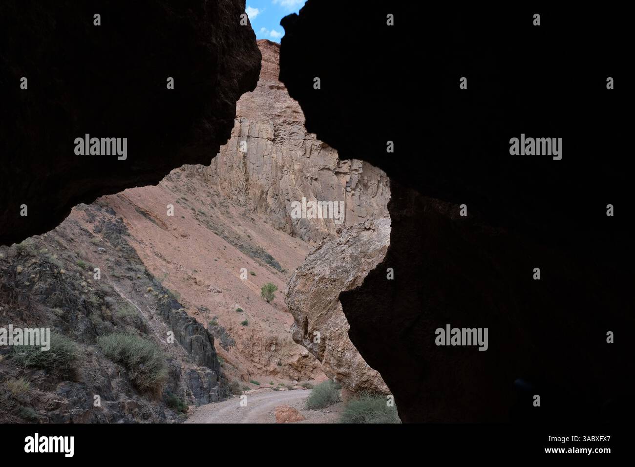 Passage between two rocks in the Charyn canyon Stock Photo - Alamy