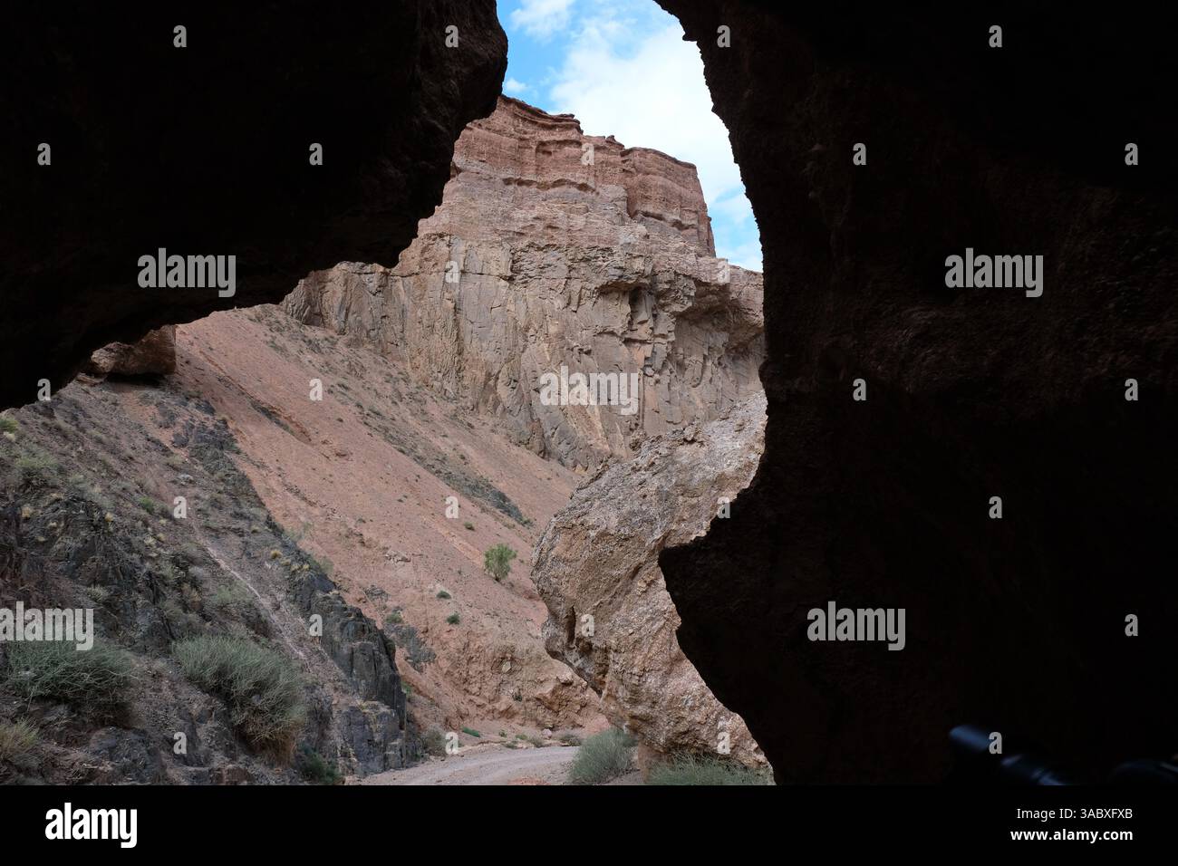 Passage between two rocks in the Charyn canyon Stock Photo - Alamy