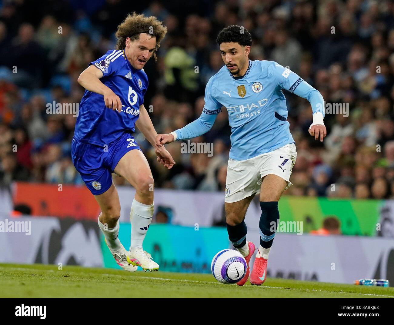 Manchester, UK. 2nd Apr, 2025. Omar Marmoush of Manchester City (R) is ...