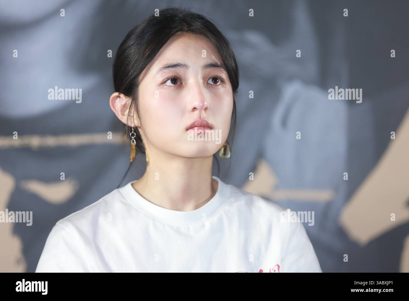 Chinese actress Zhang Zifeng attends an activity in Beijing, China, 26 March, 2025 Stock Photo ...