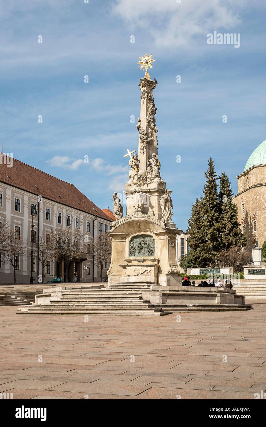The statue of Trinity and mosque of pasha qasim, Pecs, Hungary, March ...