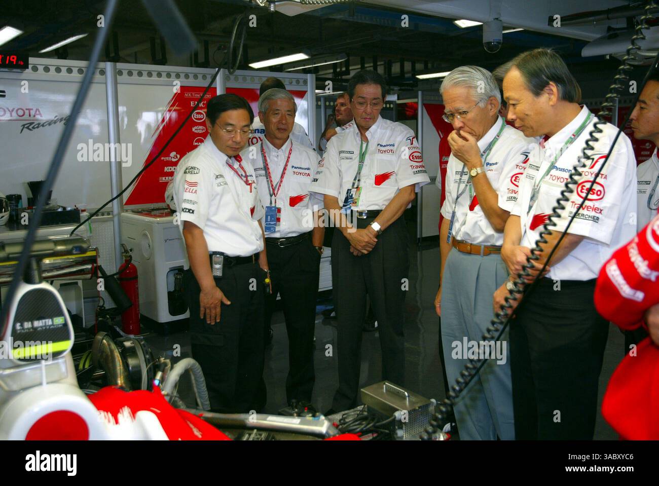 Mr Nakamura (JPN) President of Panasonic is given a Toyota garage tour ...