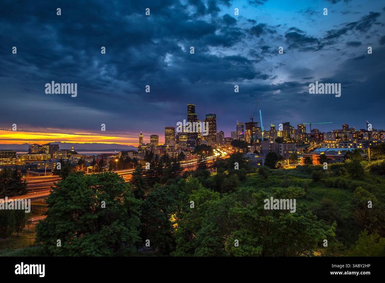 Nightfall Over Seattle Skyline with traffic on the I-5 freeway Stock ...